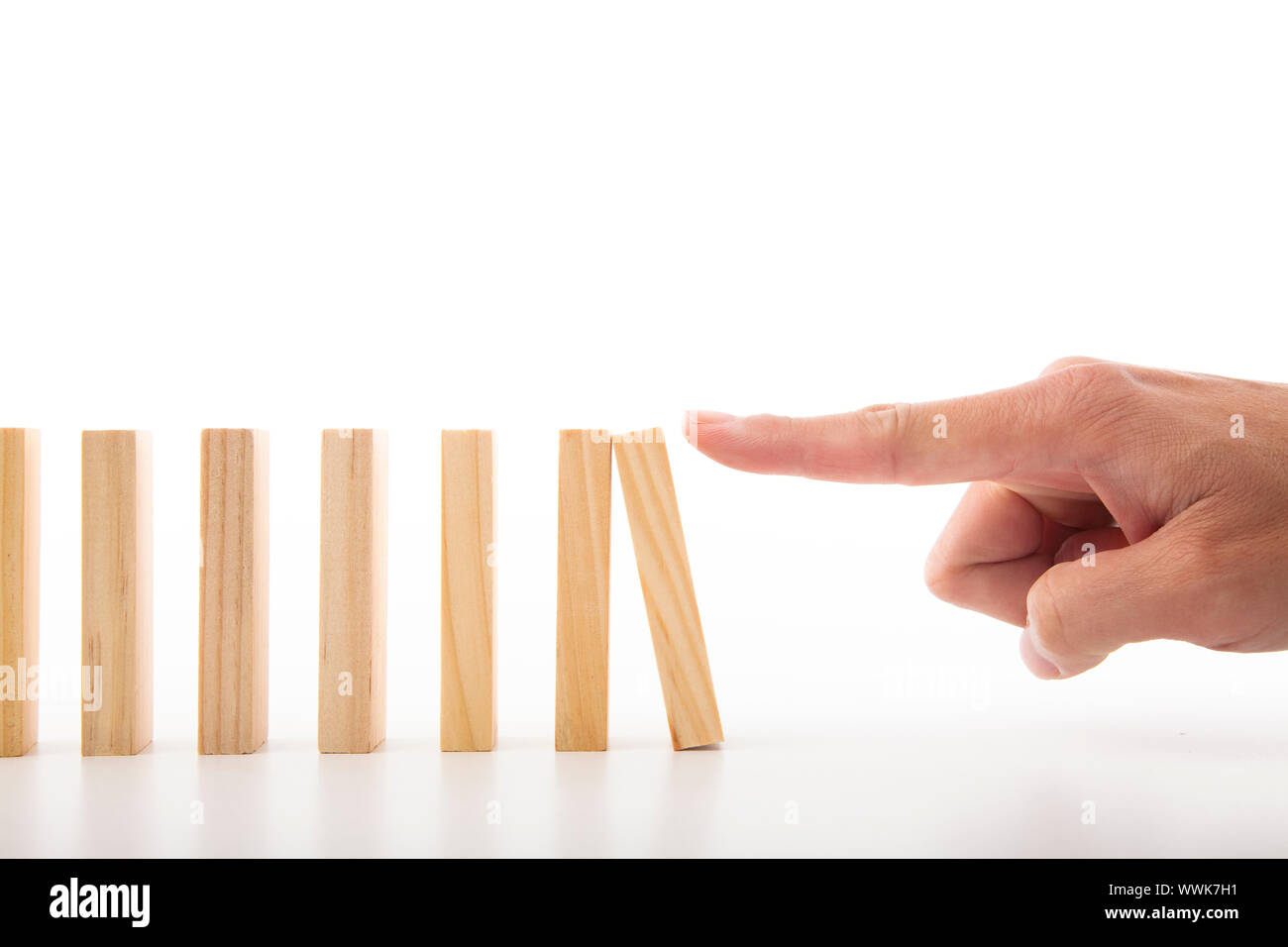 hand push down the wall concept Stock Photo - Alamy