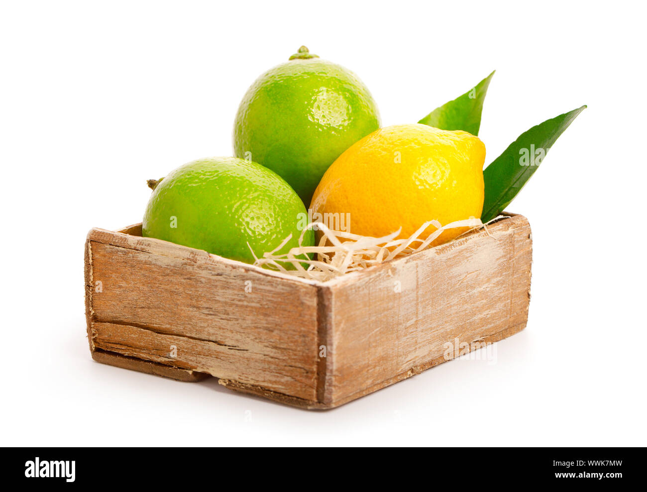 yellow and green lemon over white background Stock Photo - Alamy