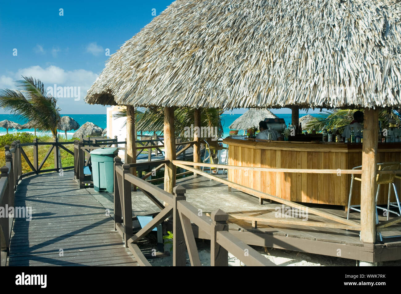 a palapa bar by the beach at a tropical resort Stock Photo - Alamy