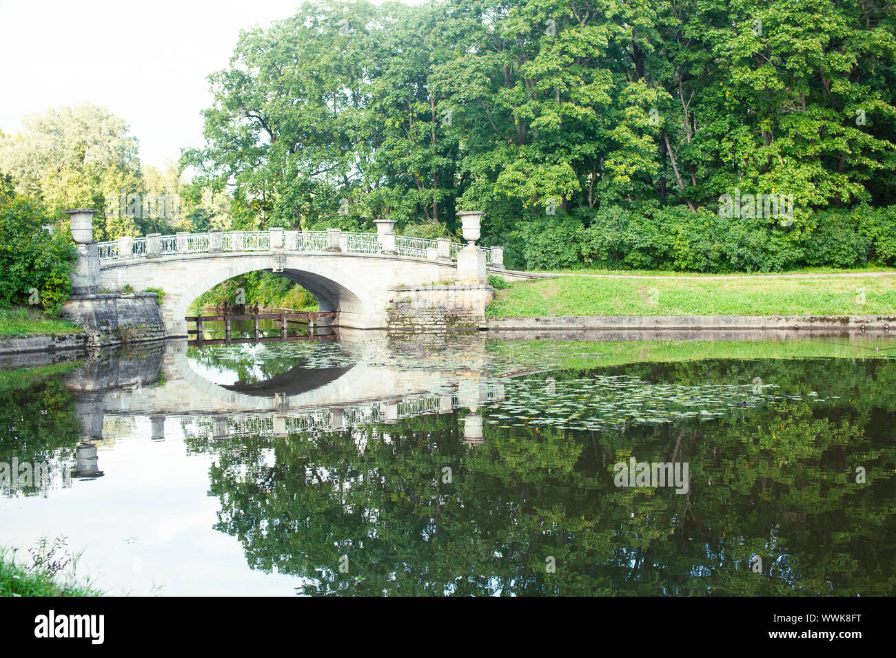 old vintage bridge on river in green park, landscape historical Stock ...