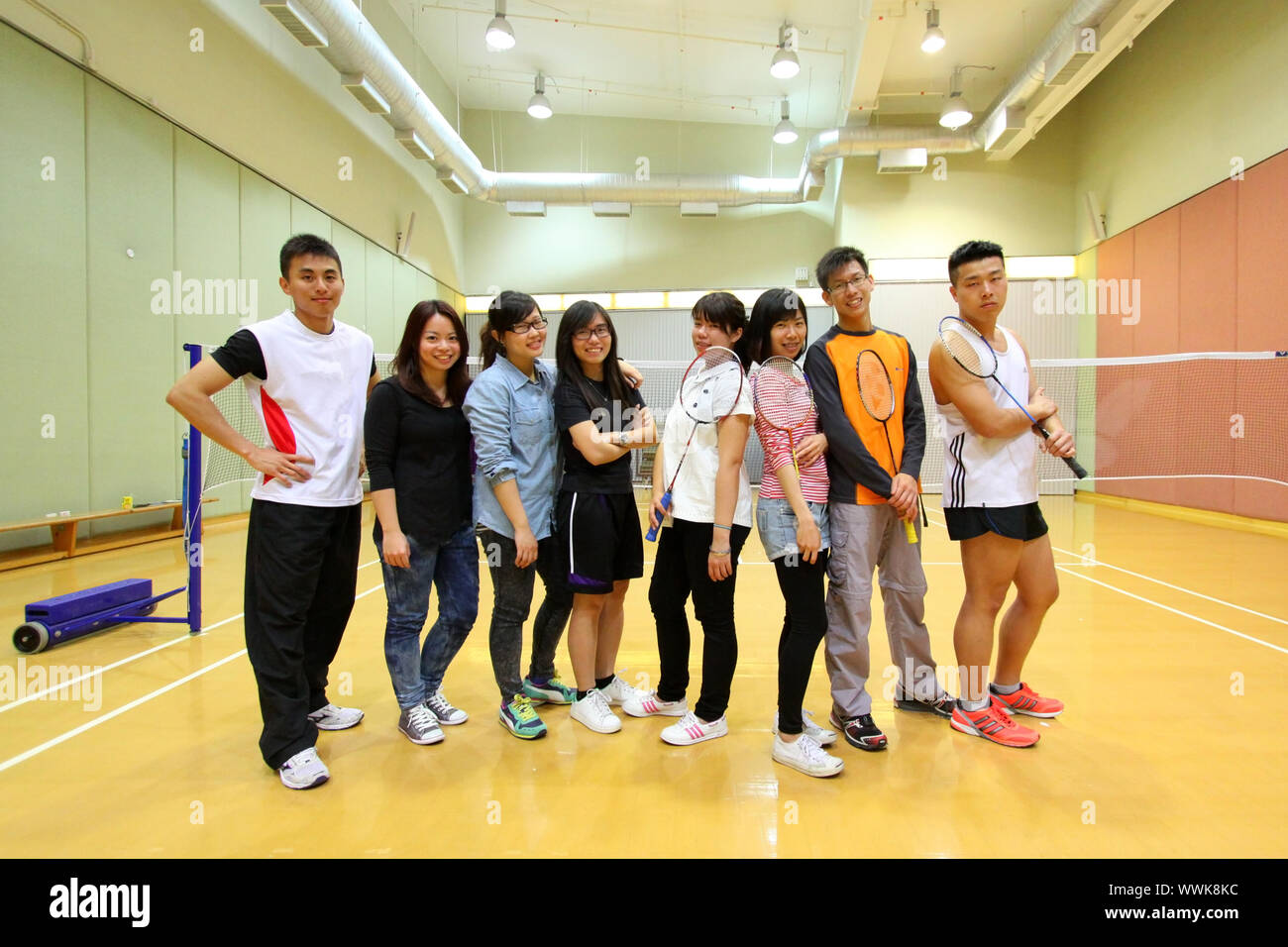 Asian friends playing badminton Stock Photo - Alamy