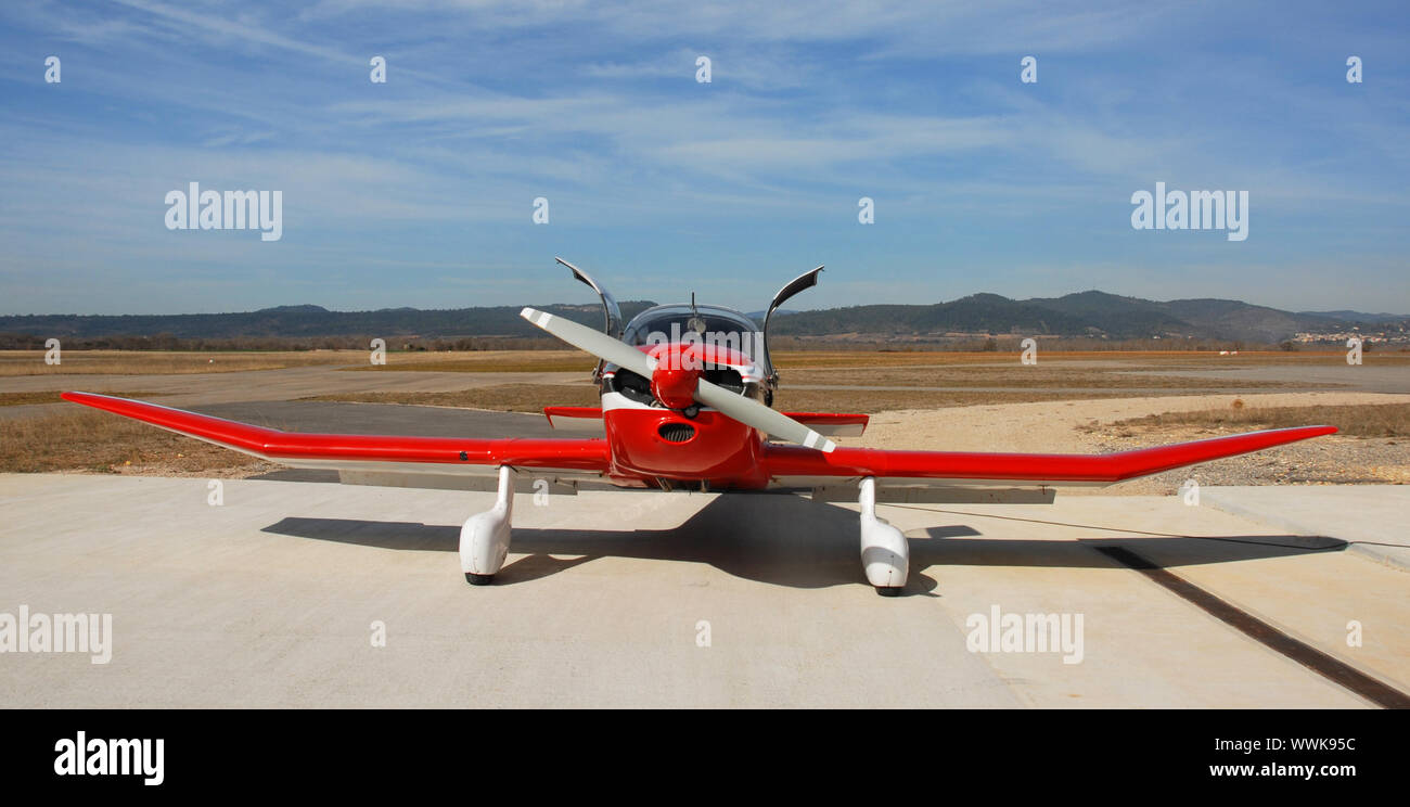 private red plane Robin DR 250 on an airport in the south in France ...