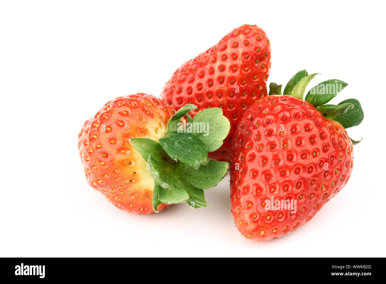strawberry pile on white background Stock Photo - Alamy