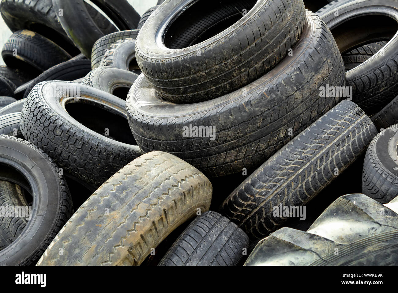 Pile of old tires Stock Photo - Alamy