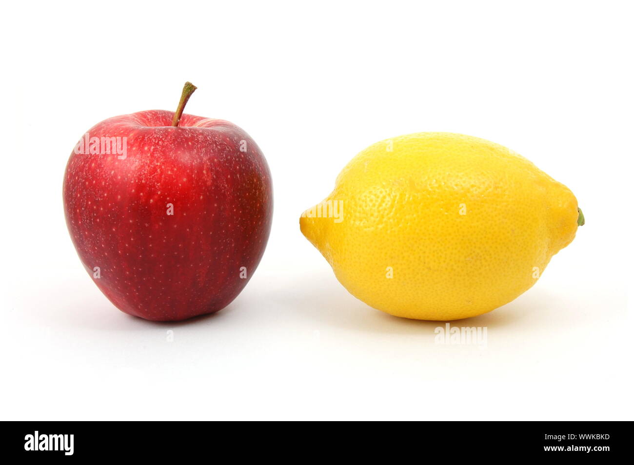 apple and lemon isolated on a white background Stock Photo - Alamy