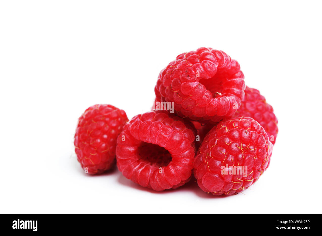raspberry pile isolated on white Stock Photo - Alamy