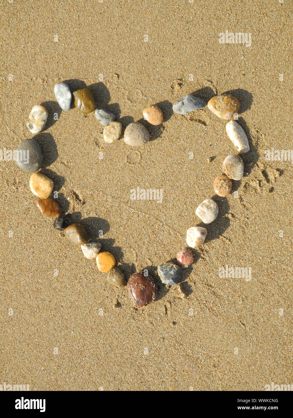 Heart of pebbles Stock Photo - Alamy