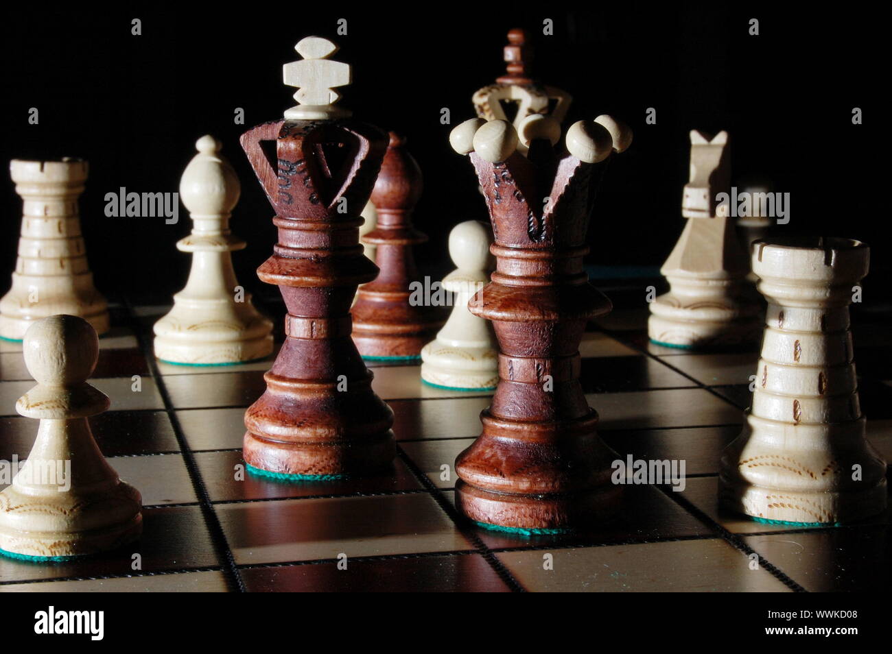chess pieces on chess board showing power and success Stock Photo - Alamy