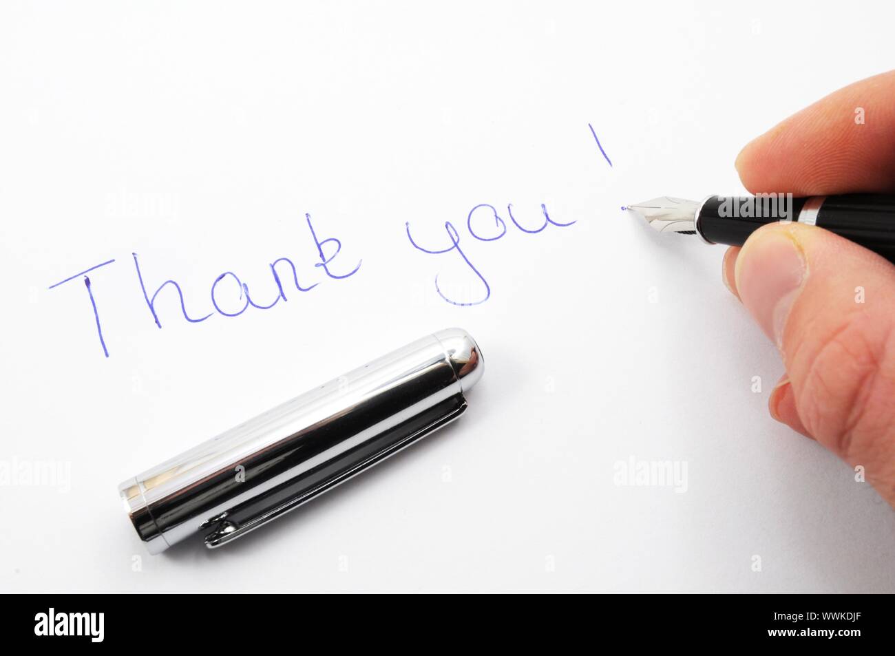thank you message on paper with pen Stock Photo - Alamy
