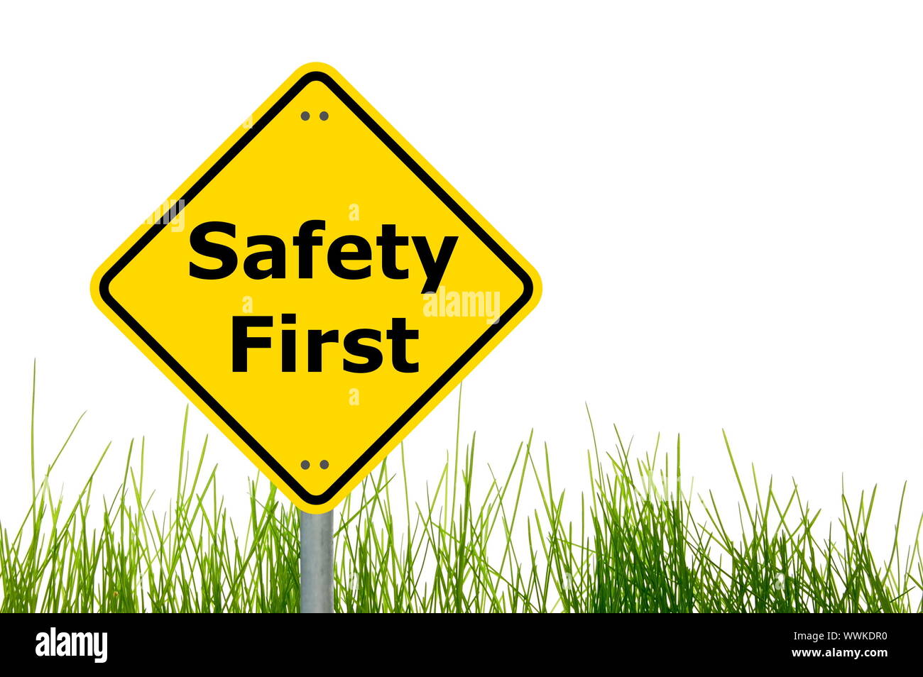 yellow sign with safety first as aid concept Stock Photo - Alamy