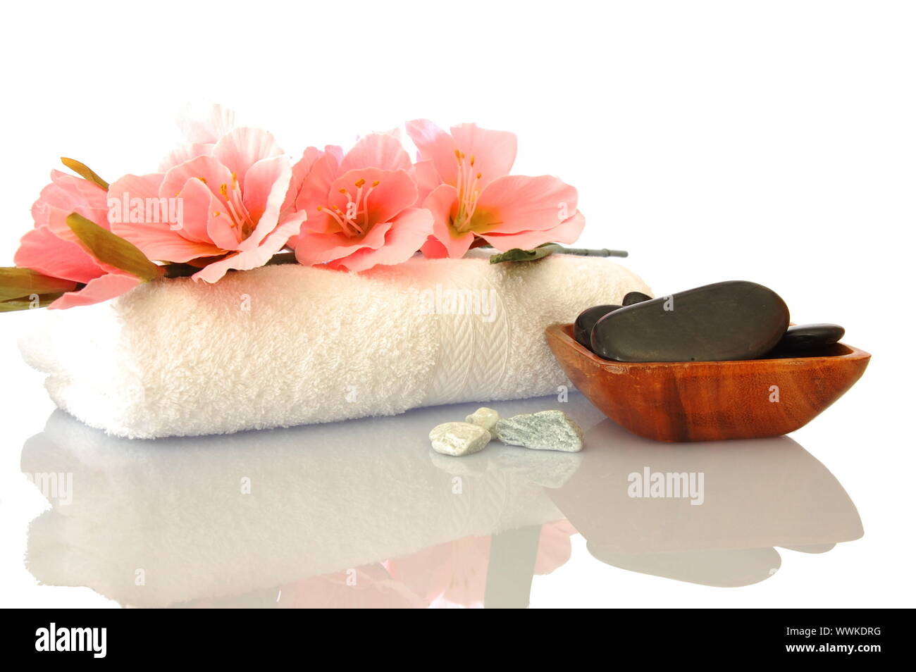spa and bath still life with flowers and pebbles showing asian ...