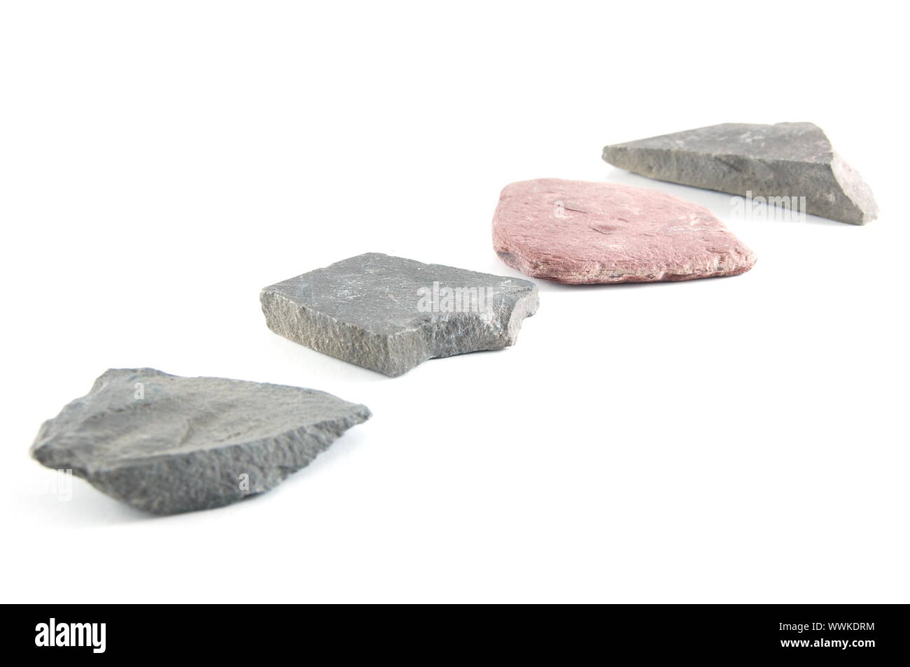 Some Stones isolated on a white background Stock Photo - Alamy