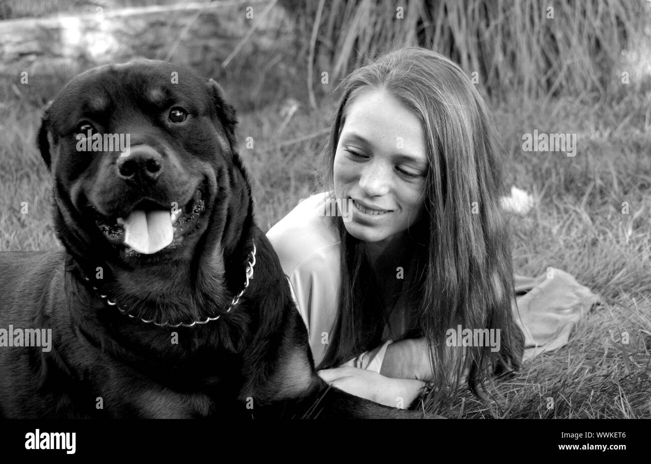 Woman large dog Black and White Stock Photos & Images - Alamy