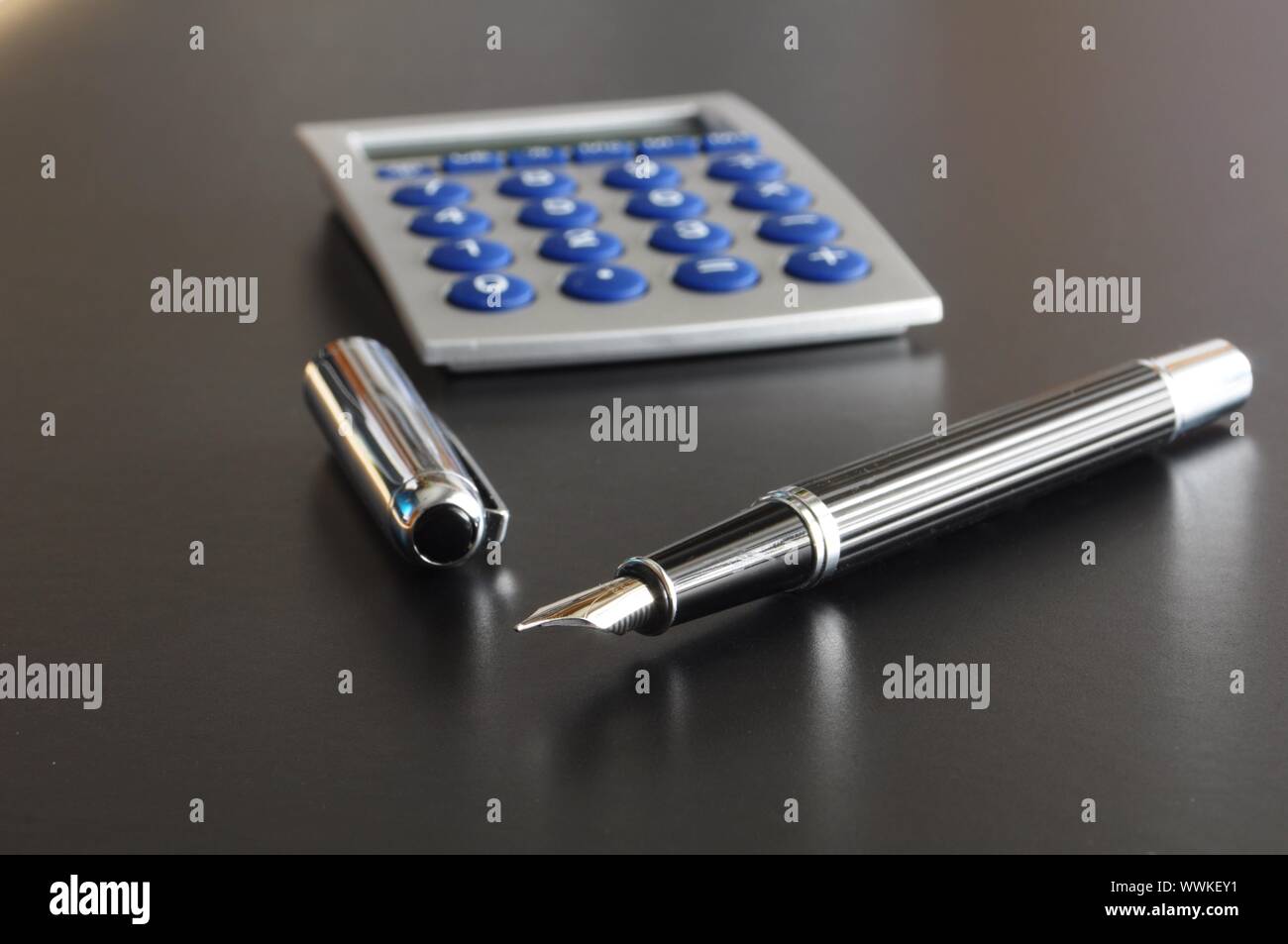 pen showing communication contact us or mail concept on black ...