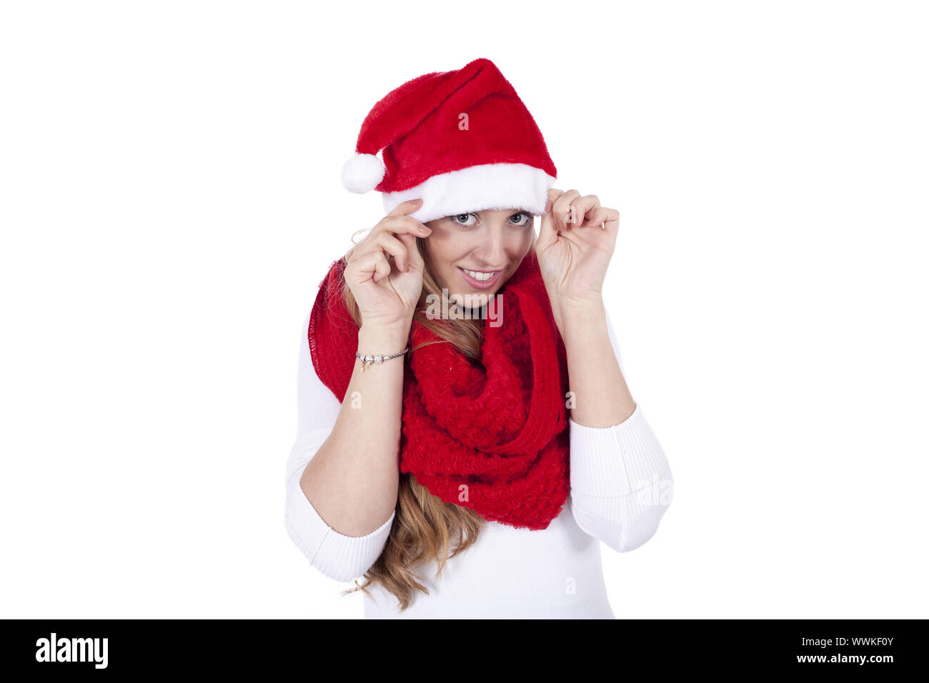 laughing young woman with a red scarf and a Santa hat Stock Photo - Alamy