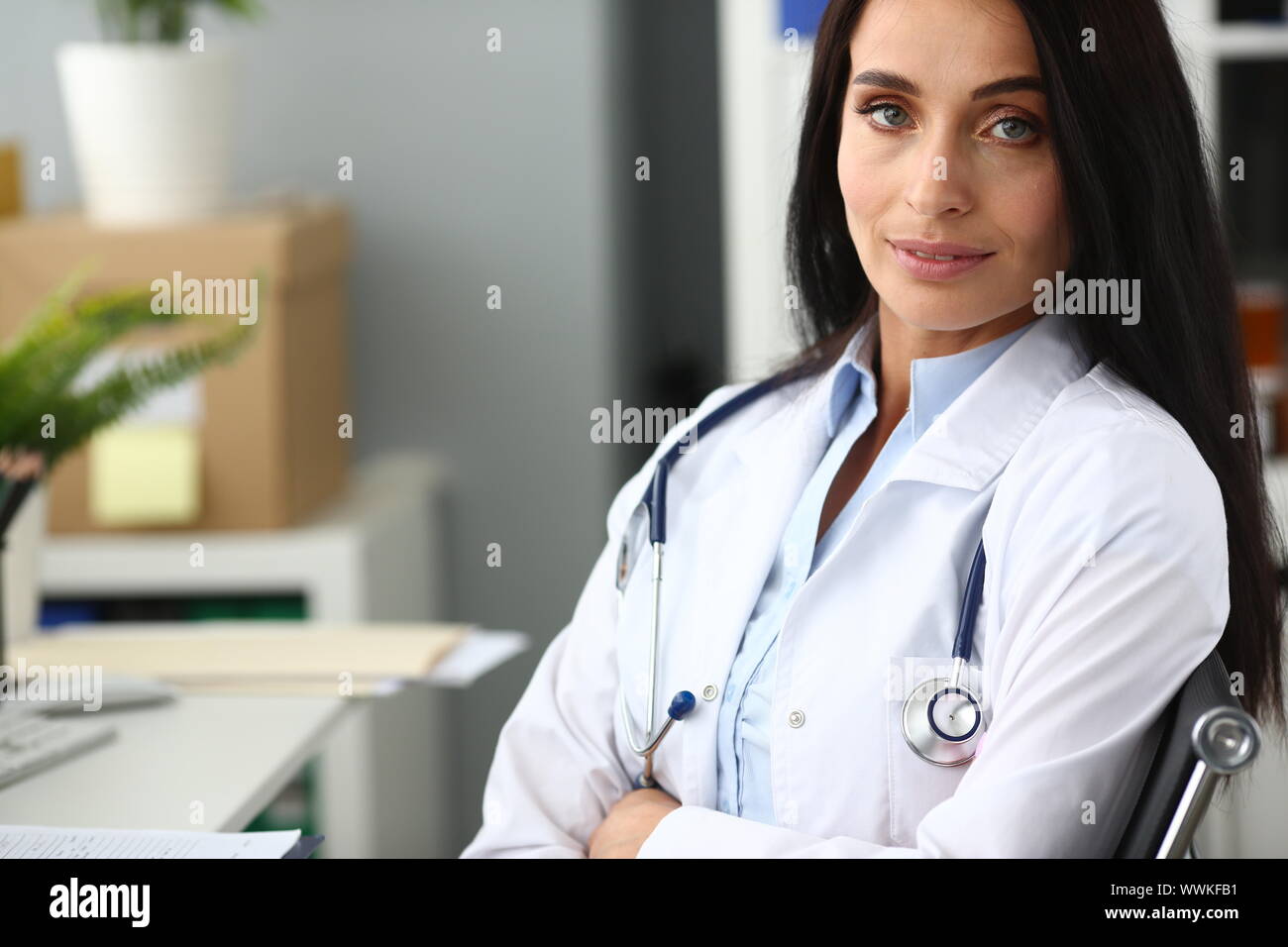 Indian female doctor portrait aganist hospital Stock Photo - Alamy