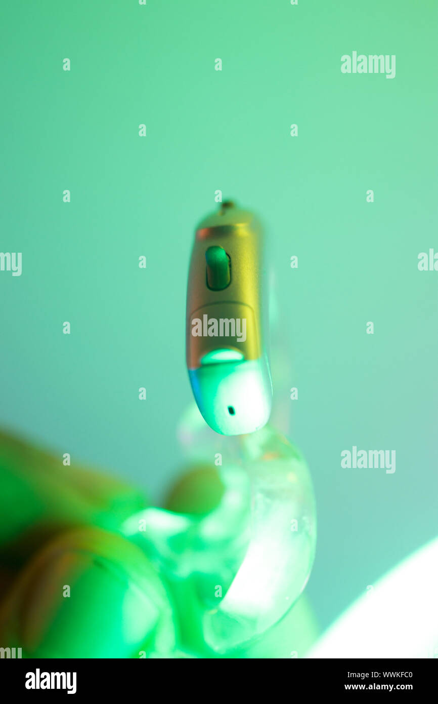 Modern digital hearing aid for deafness and deaf people Stock Photo - Alamy
