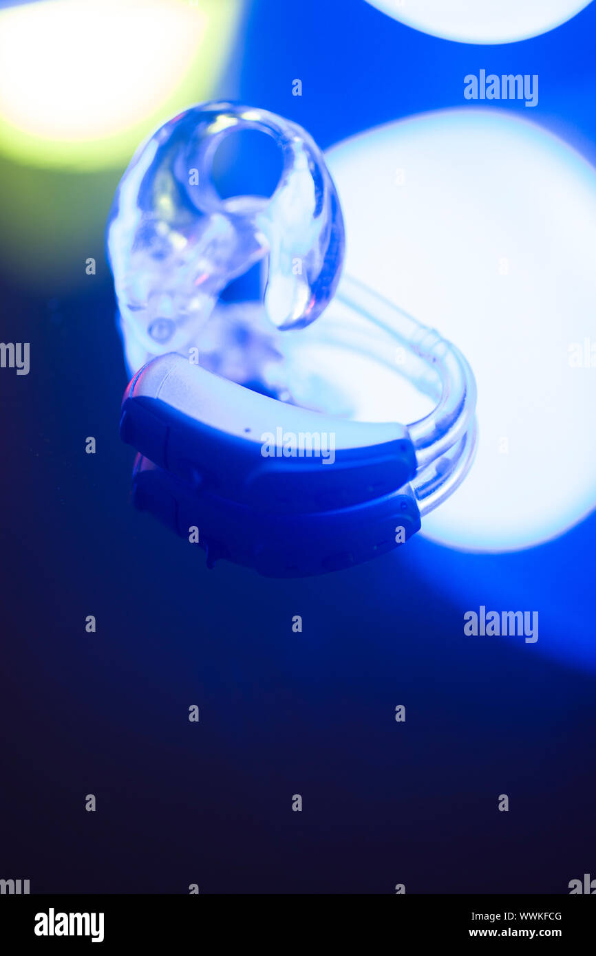 Modern digital hearing aid for deafness and deaf people Stock Photo - Alamy