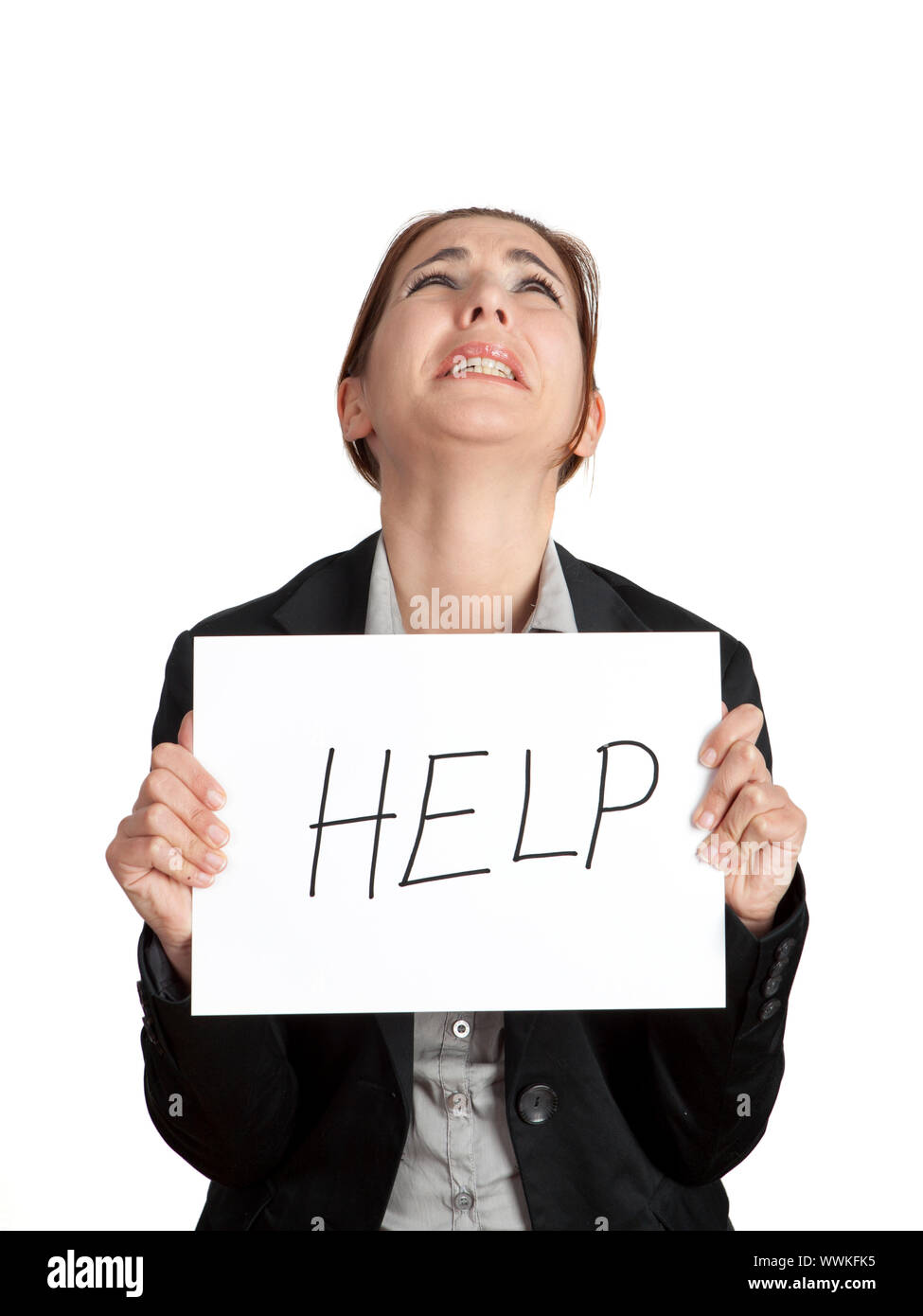 Stressed business woman imploring for help, holding a cardboard with ...