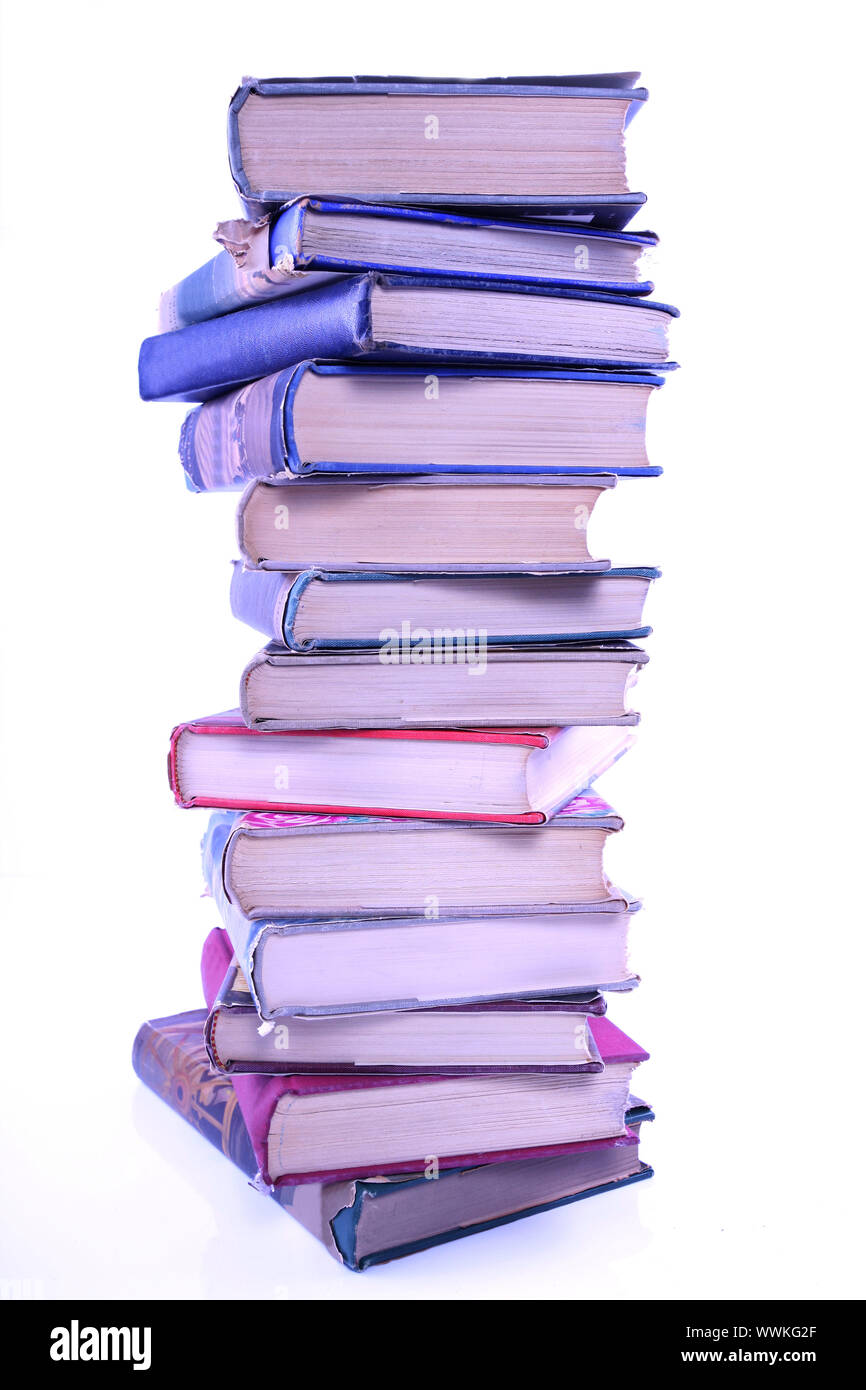 Tall stack of old books Stock Photo - Alamy