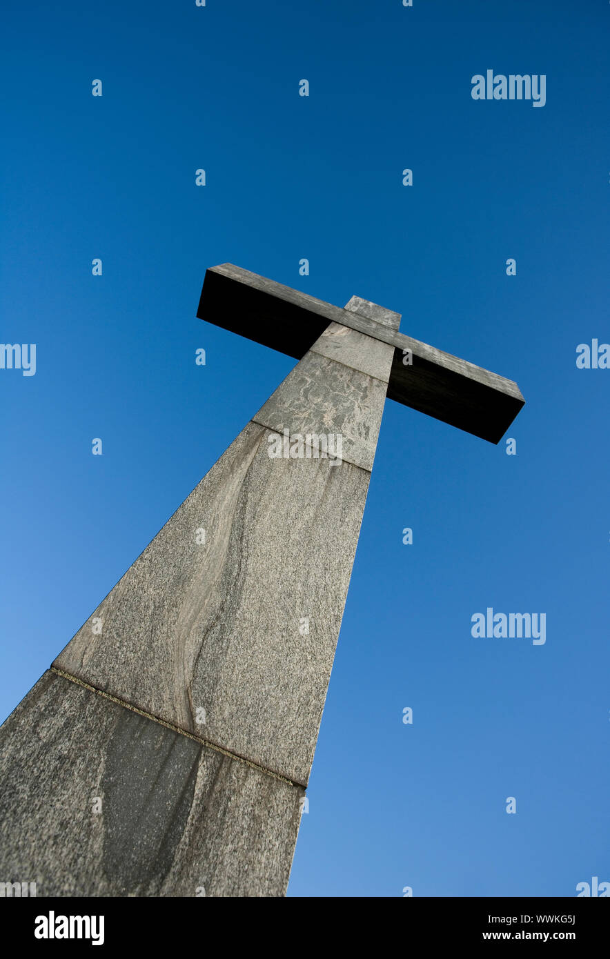 Cross symbol in front of blue sky Stock Photo - Alamy