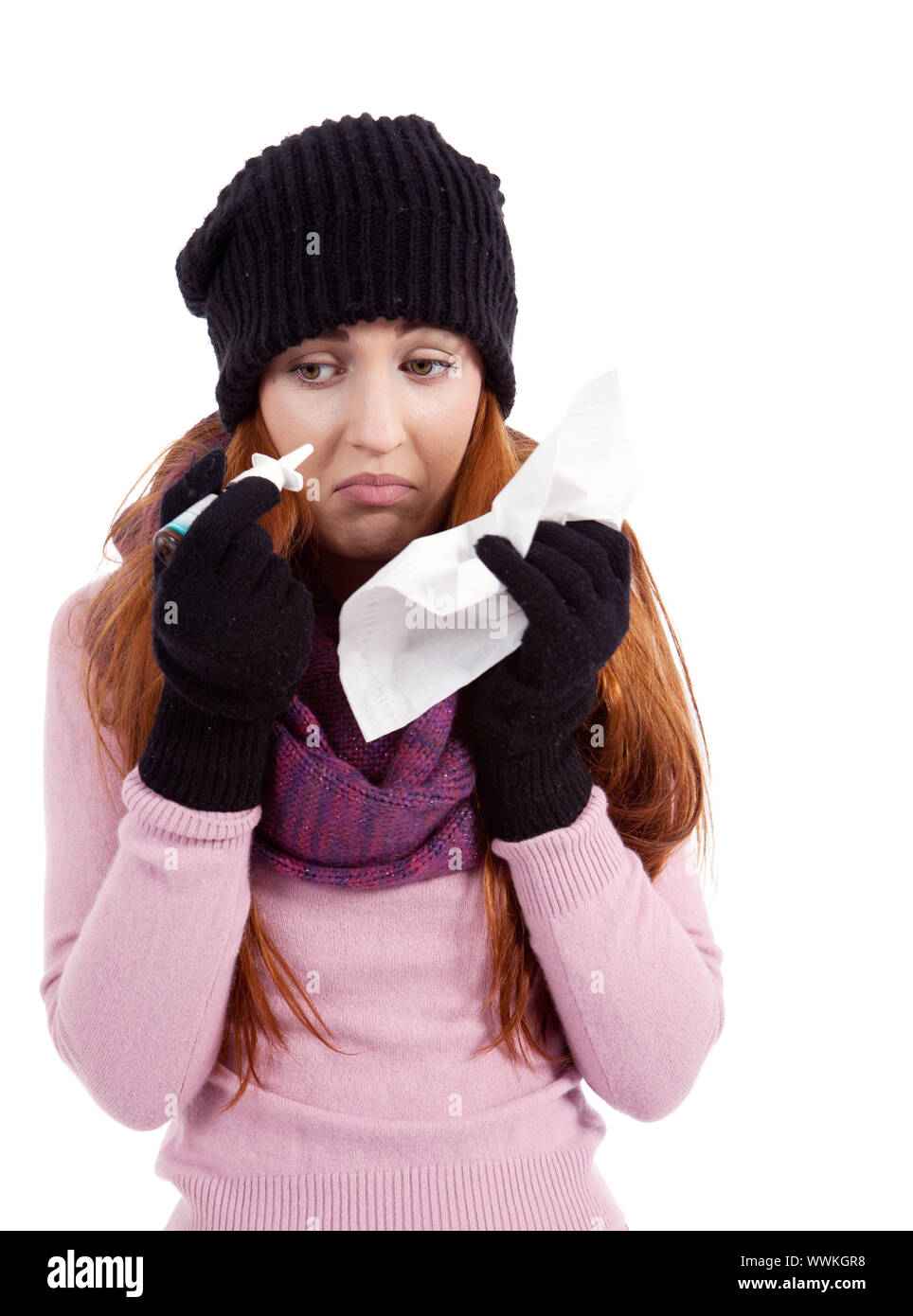 Woman with handkerchief and nasal spray with flu Stock Photo - Alamy