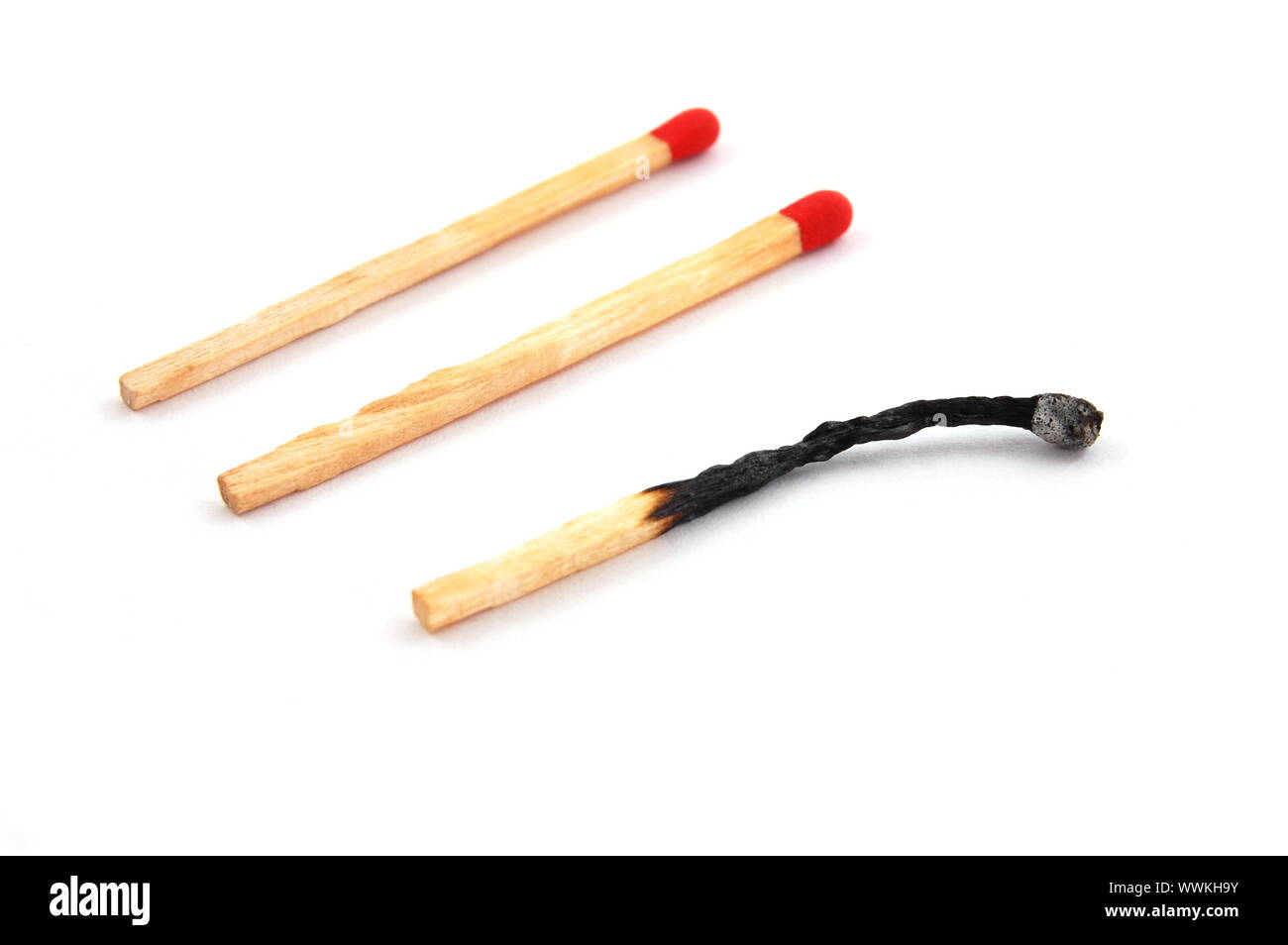 Some red matches isolated on a white background Stock Photo - Alamy