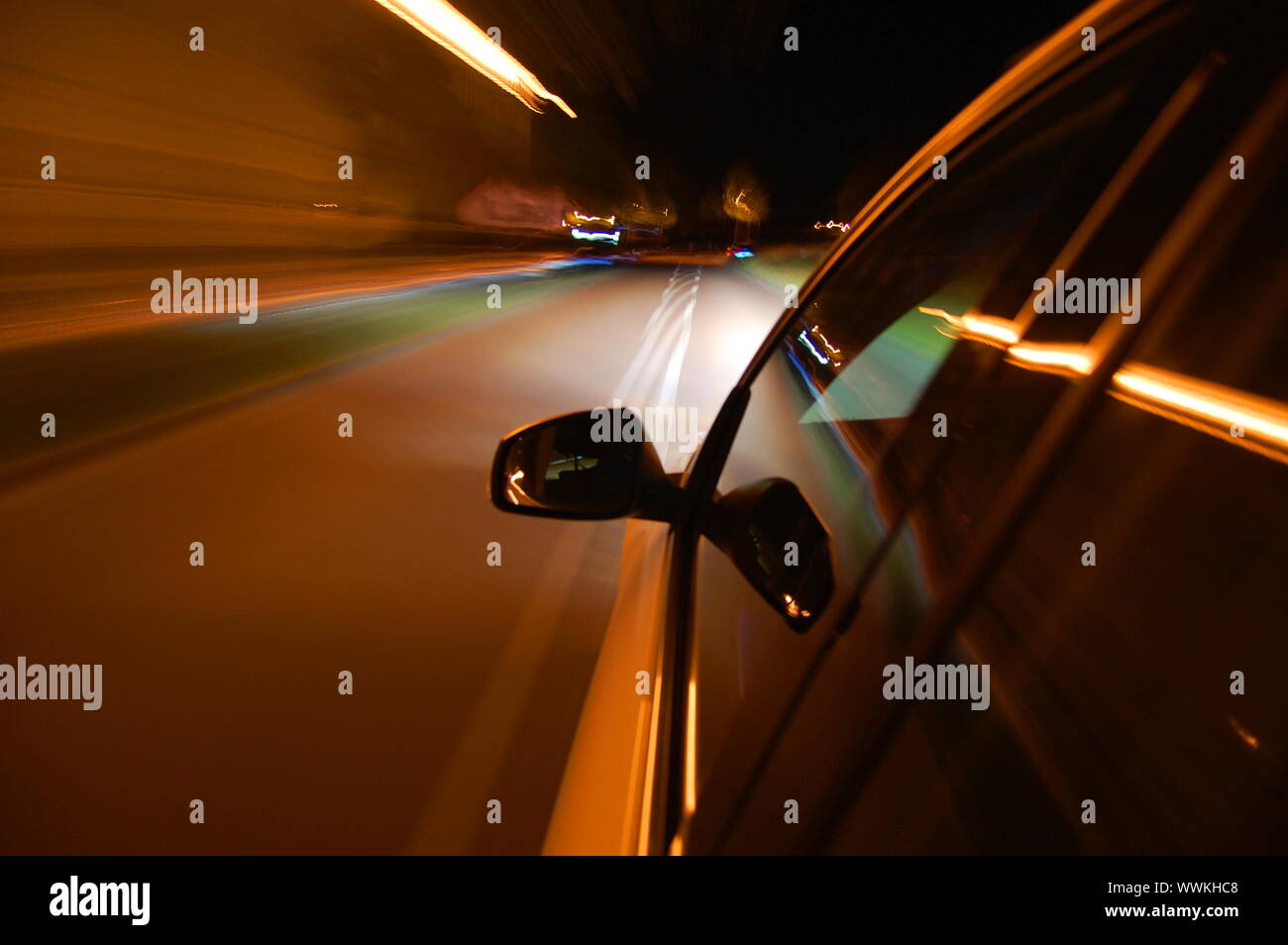 night drive with car in motion through the city shows the speed Stock ...