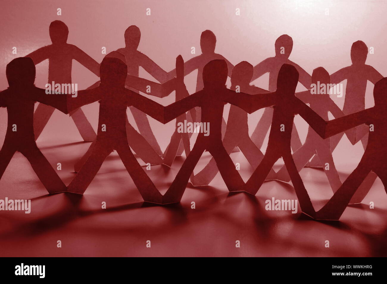 team of paper people having a party Stock Photo - Alamy