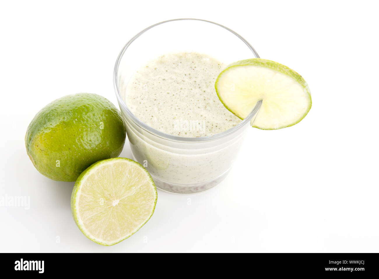 Fresh tasty yoghurt isolated with limes Stock Photo - Alamy