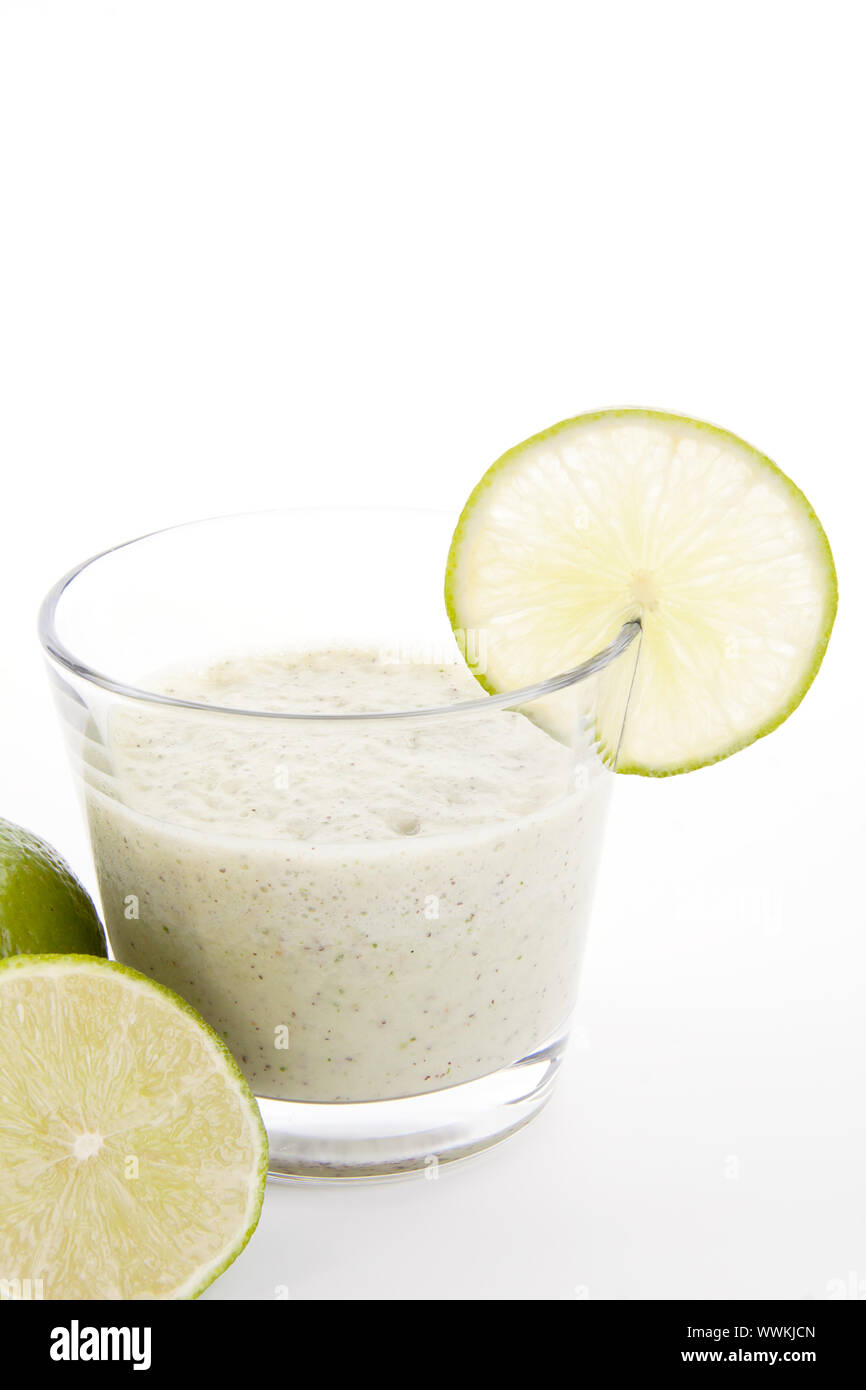Fresh tasty yoghurt isolated with limes Stock Photo - Alamy