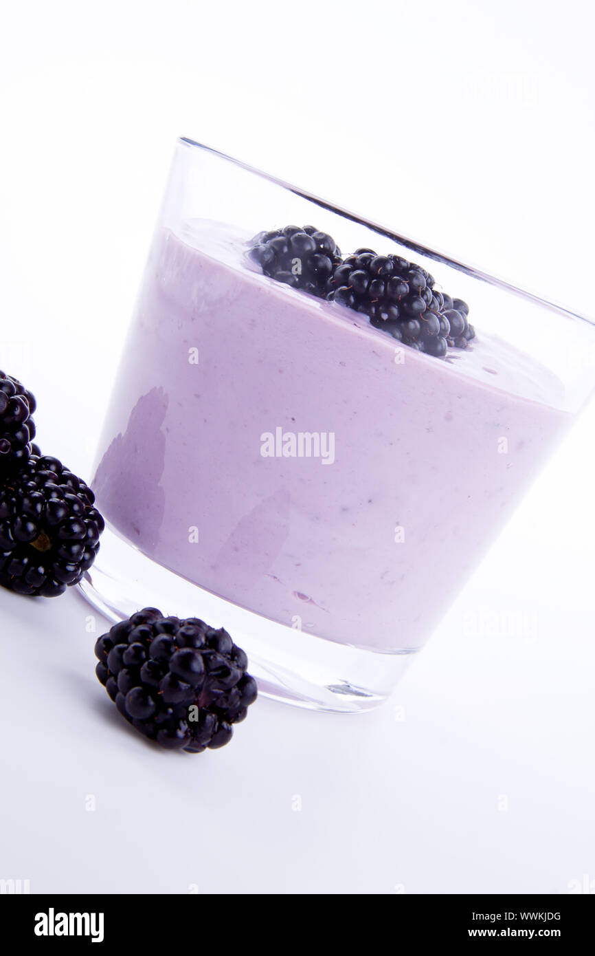 fresh tasty yoghurt isolated with blackberries Stock Photo - Alamy