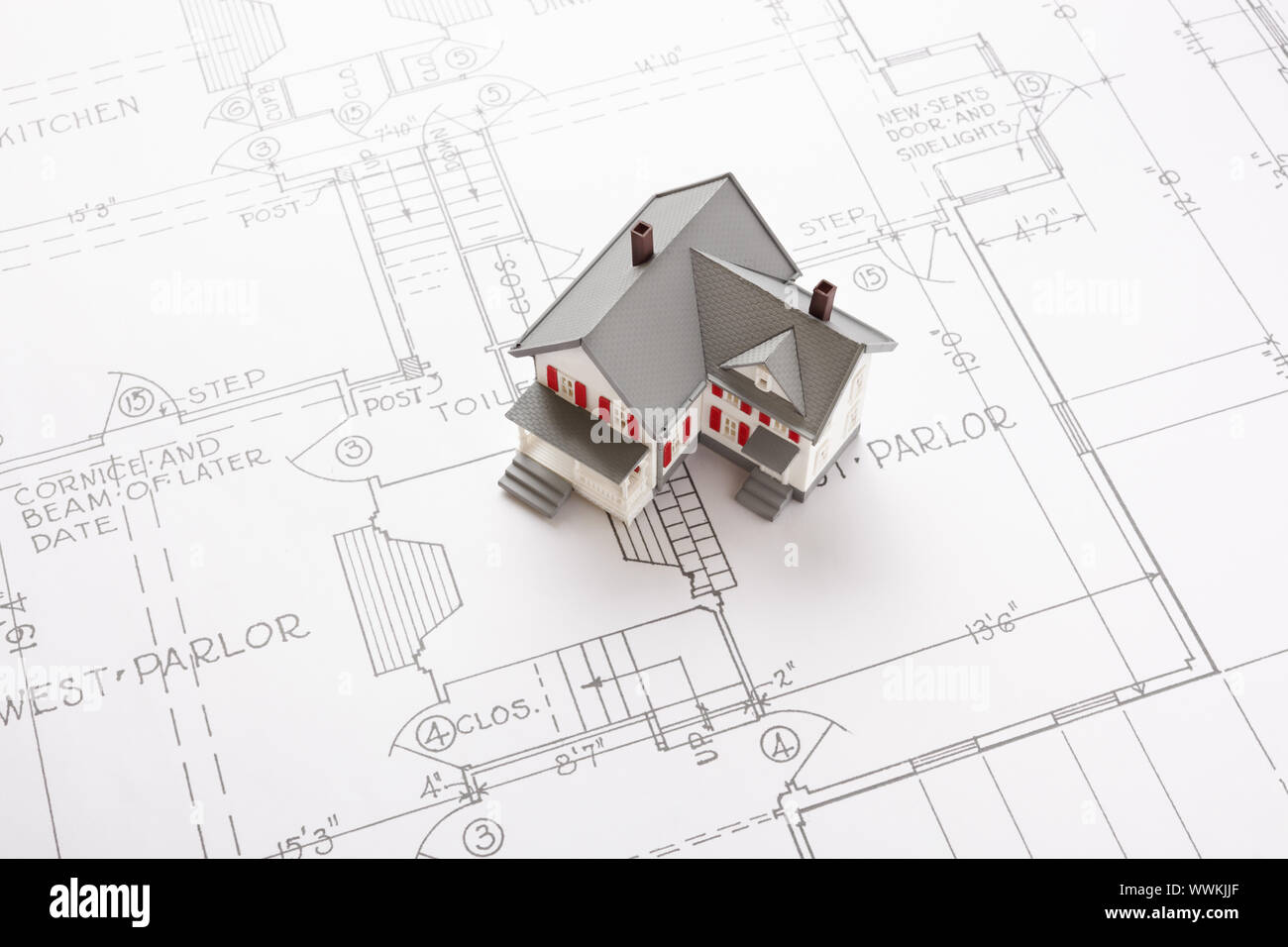 small copy of house with architect's plan (plan are fake and made by me ...