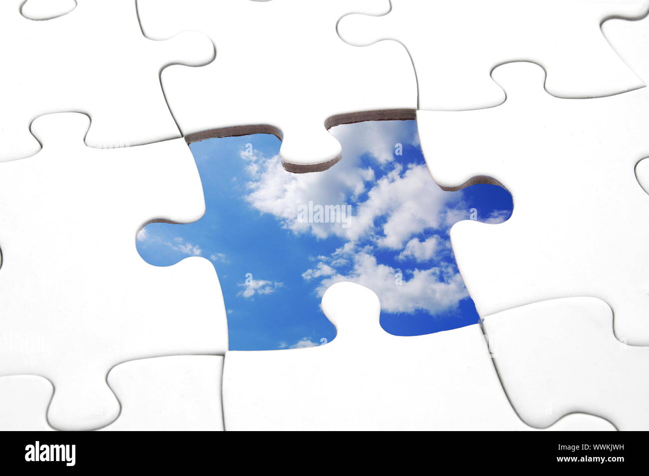 puzzle and blue cloudy sky showing freedom concept Stock Photo - Alamy