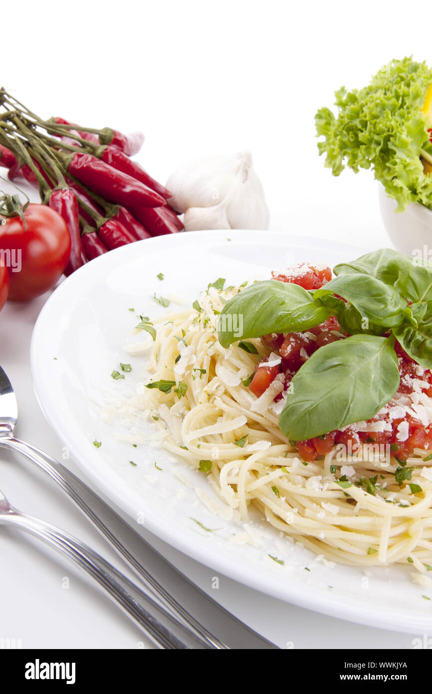 fresh tasty spaghetti with tomato sauce basil and Parmesan cheese ...