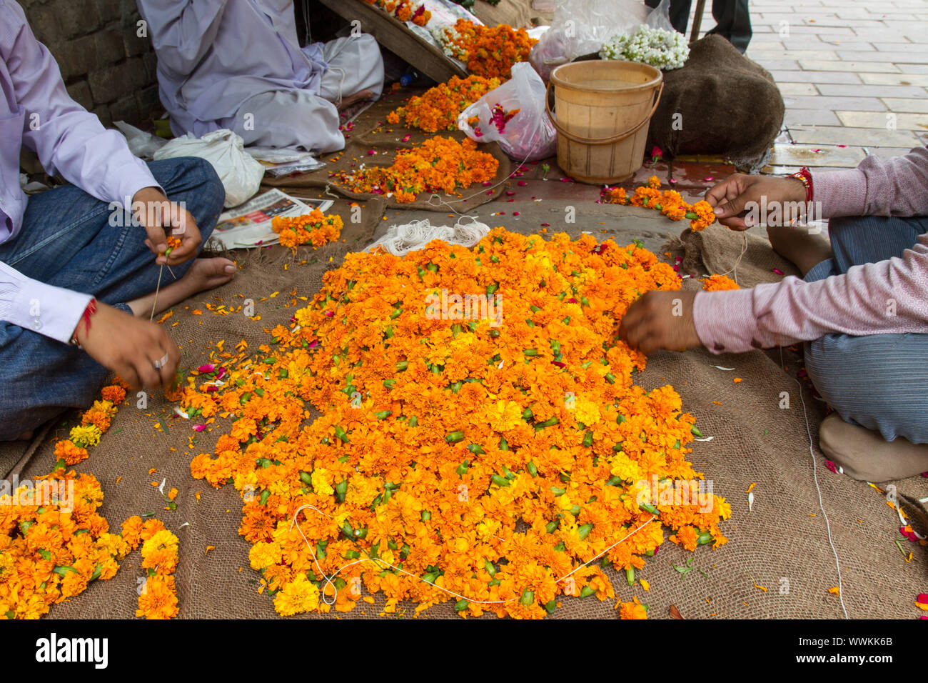 Manufacture of flower decorations in India Stock Photo - Alamy