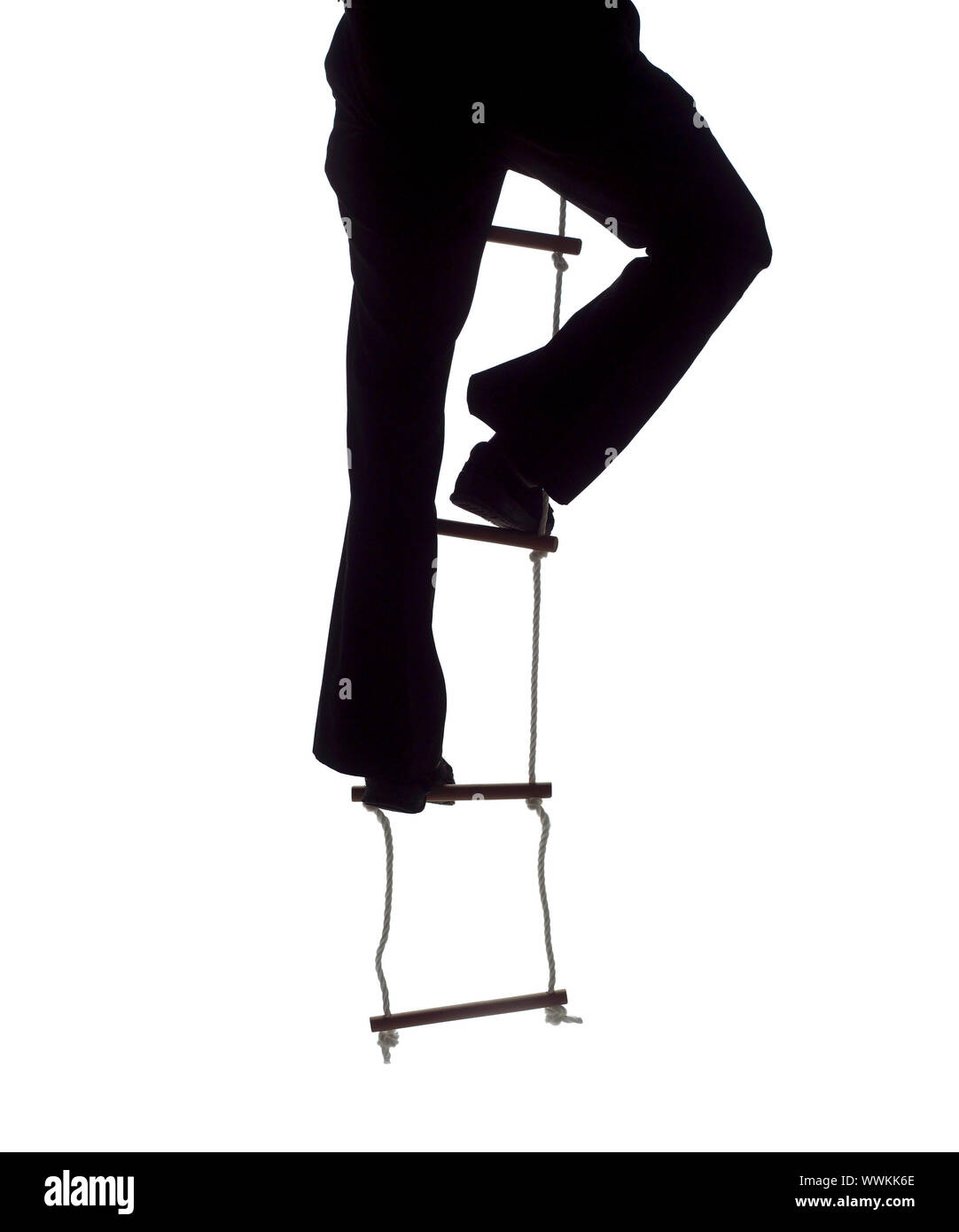 Climbing up the Rope Ladder Stock Photo - Alamy