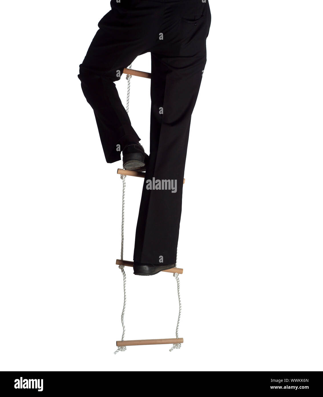 Climbing up the Rope Ladder Stock Photo - Alamy