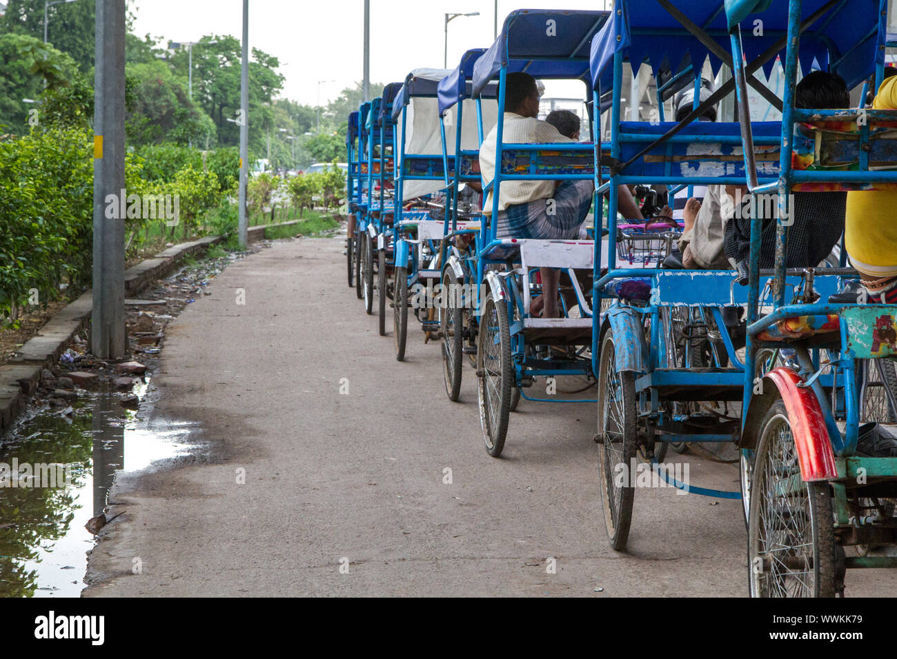 Rickshaws in Delhi, India, waiting for passengers Stock Photo - Alamy