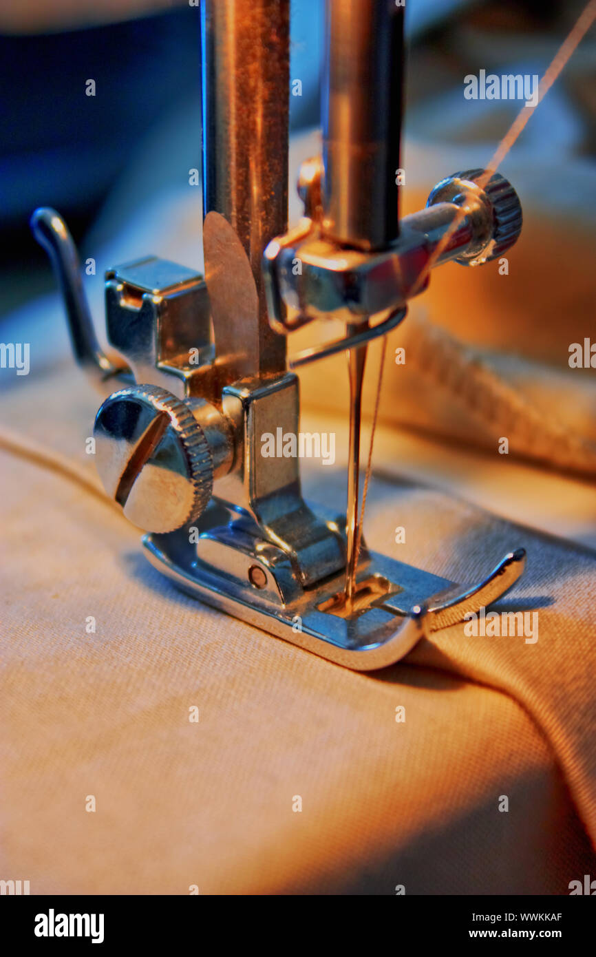 sewing machine and item of clothing Stock Photo - Alamy