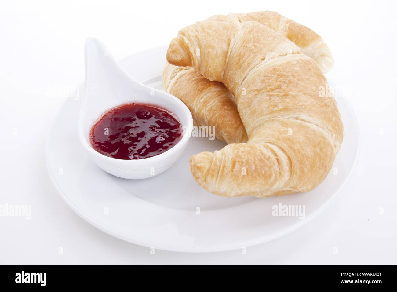 fresh croissant with strawberry jam isolated on white Stock Photo - Alamy