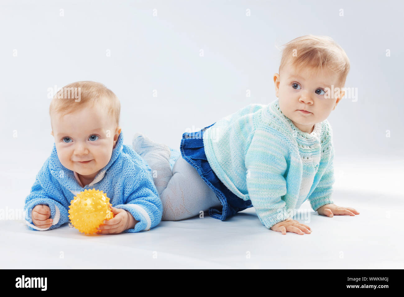 Studio portrait of two little children twins Stock Photo - Alamy