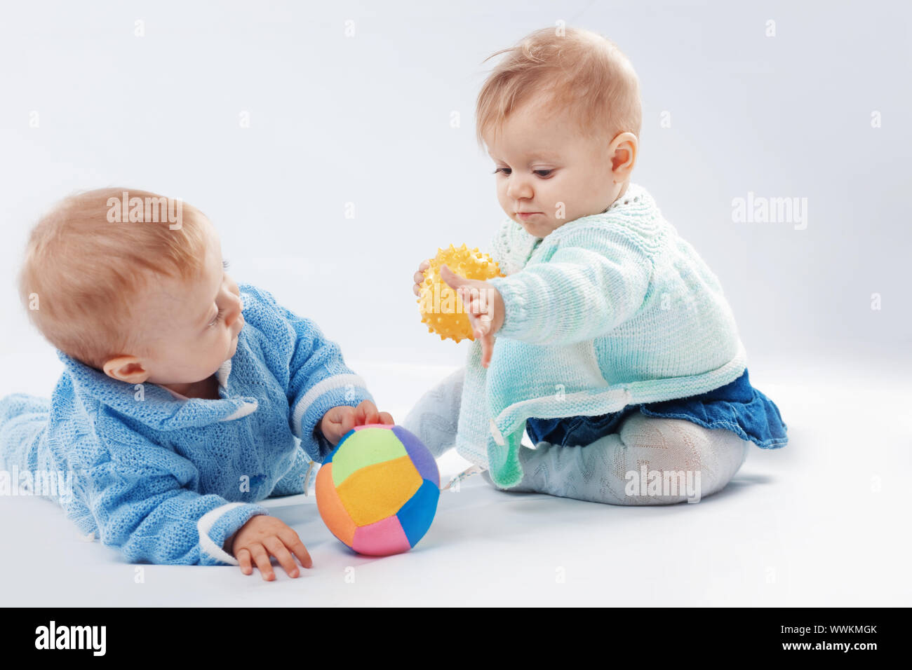 Studio portrait of two little children twins Stock Photo - Alamy