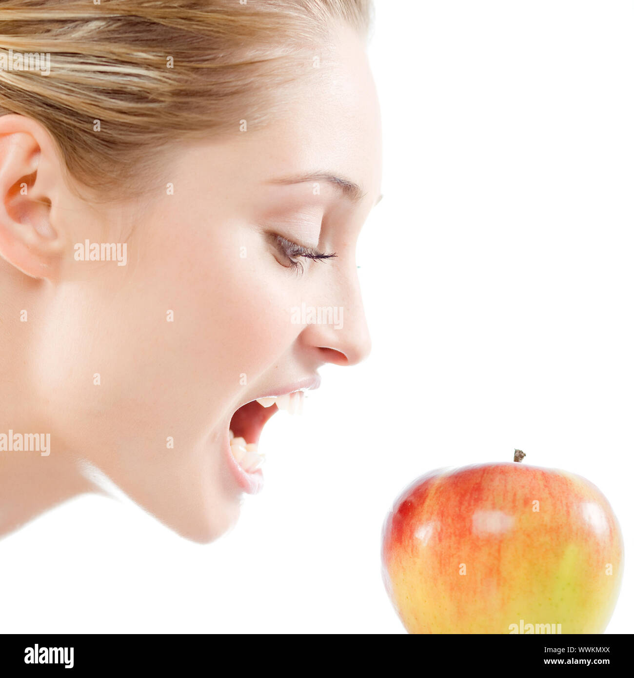 Woman with apple Stock Photo - Alamy