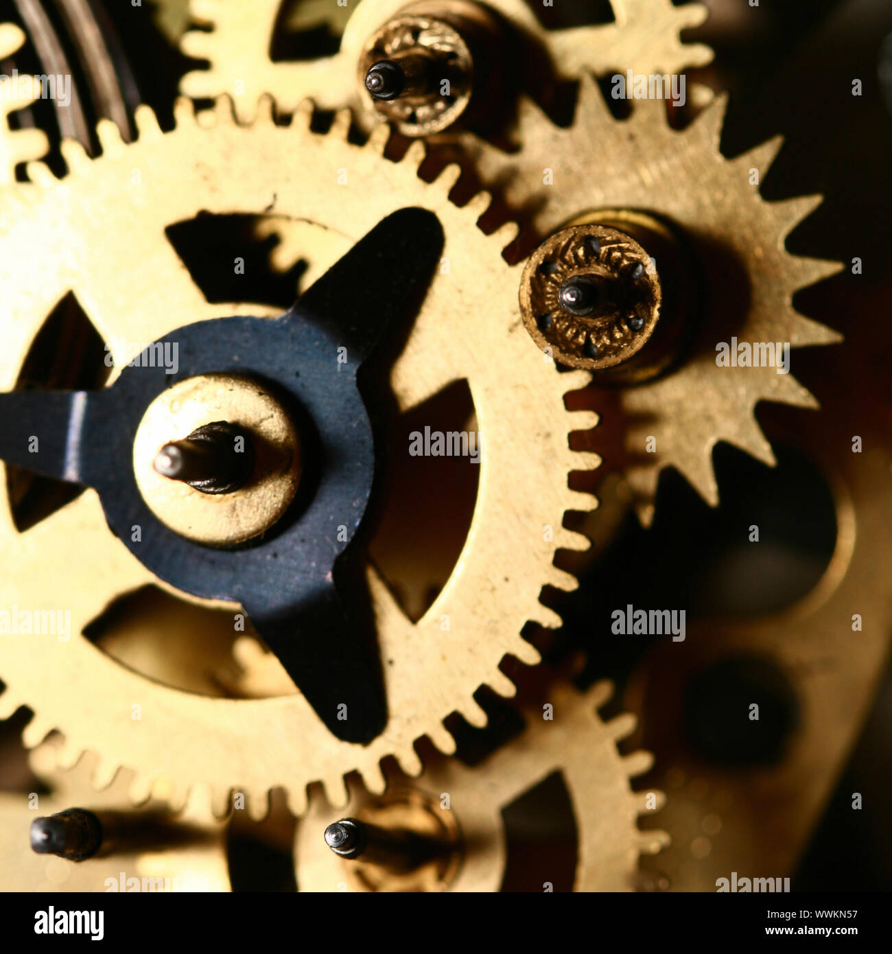 time gear inside my rare clock Stock Photo - Alamy