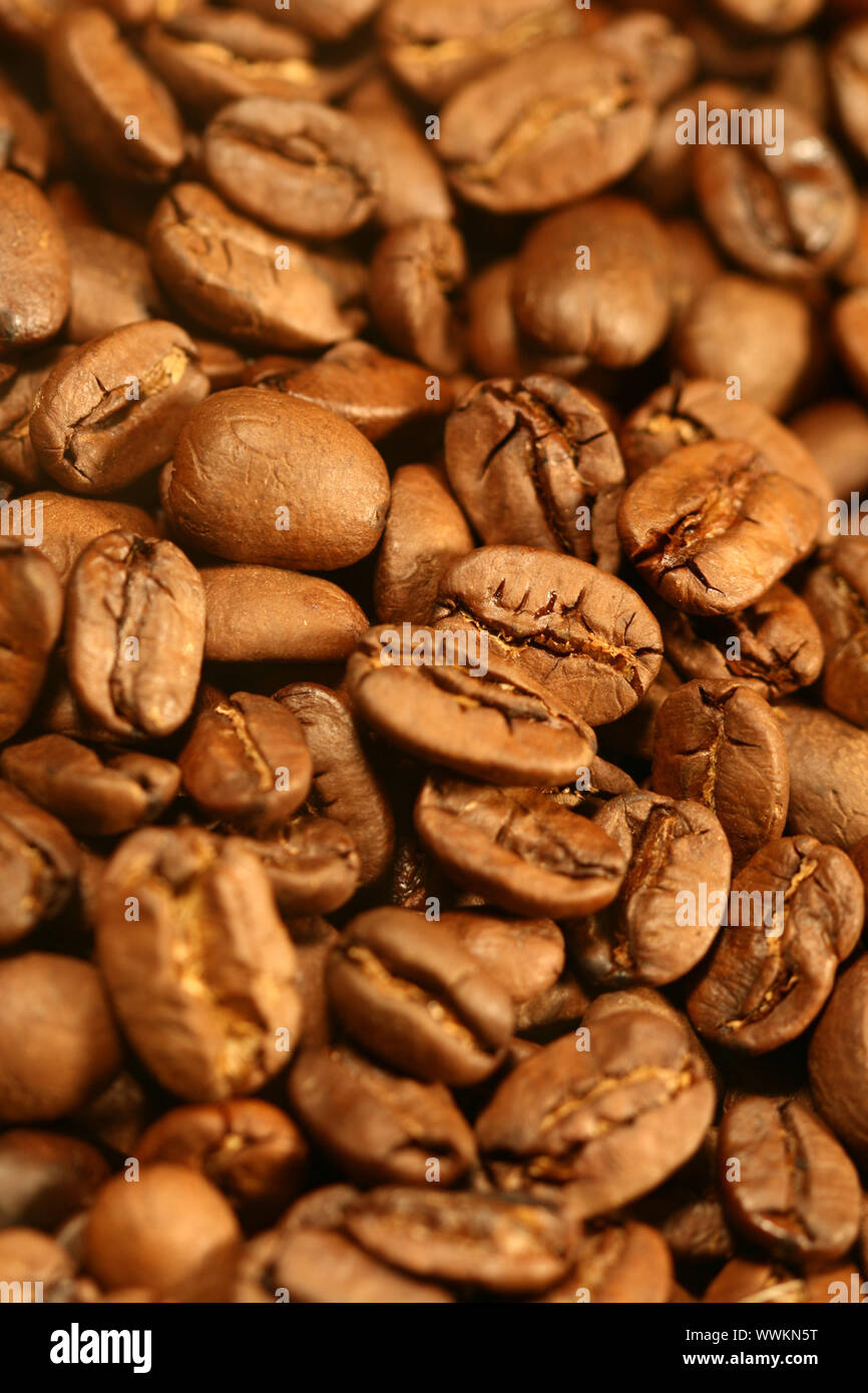 very hot big black coffee beans macro Stock Photo - Alamy