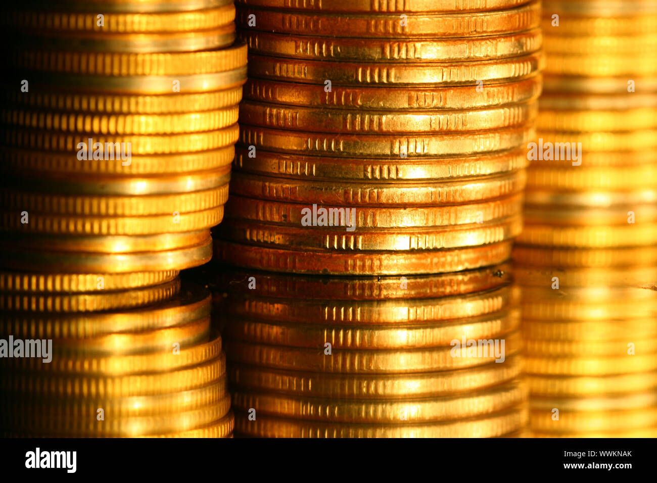 gold coins shiny finance background Stock Photo - Alamy