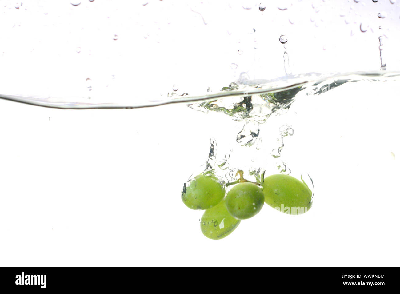 grape water splash isolated freshness concept Stock Photo - Alamy
