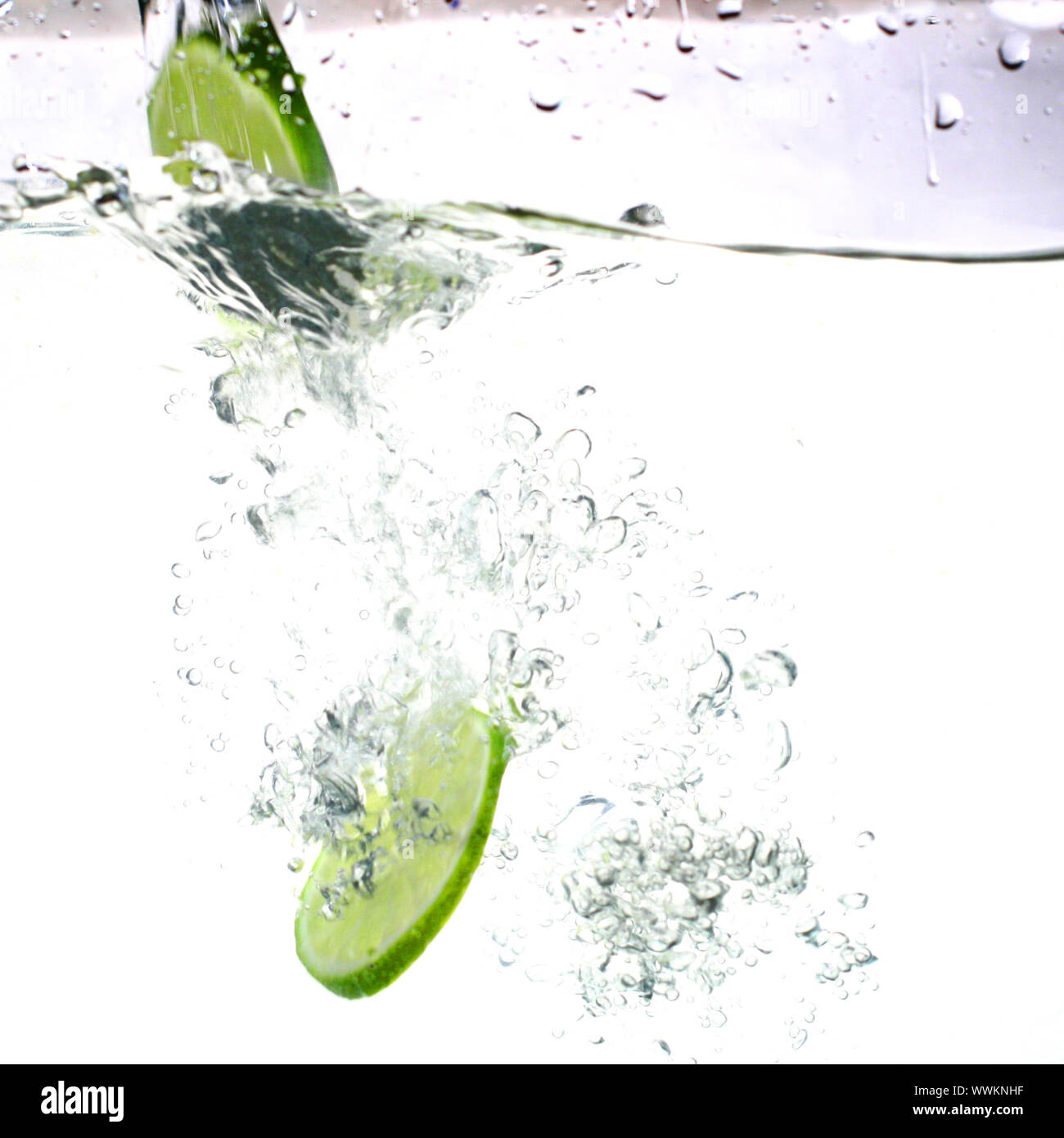lime water splash freshness drink concept Stock Photo - Alamy