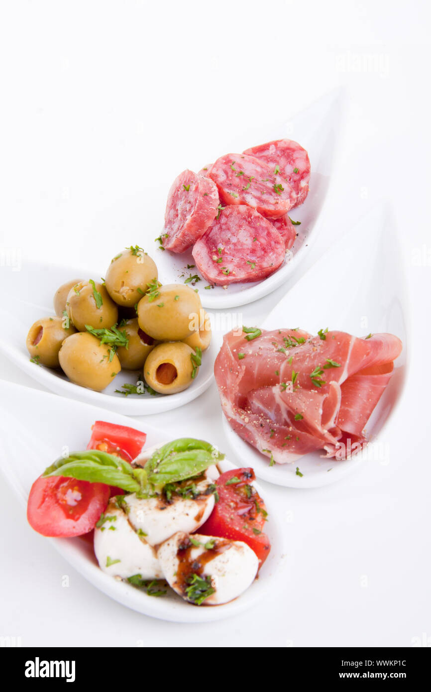 mixed starter with parma parmesan tomato olives on a plate Stock Photo ...